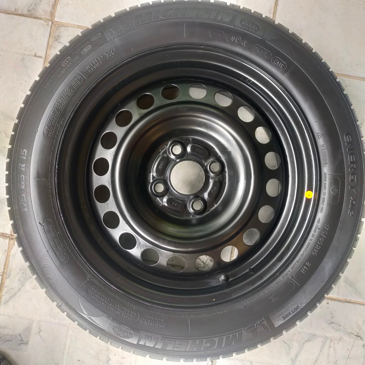 ล้อกะทะขอบ15 ดุม 56.1พร้อมยาง Michelin XM2 ปี19( 2119)ขนาด175/65/R15 ...