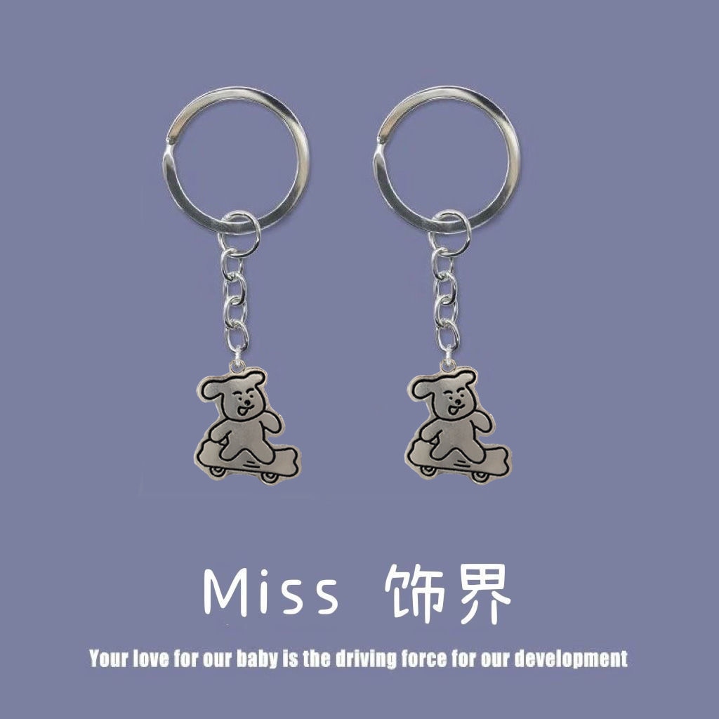 Skateboarding dog keychain simple cartoon creative personality key ins ...
