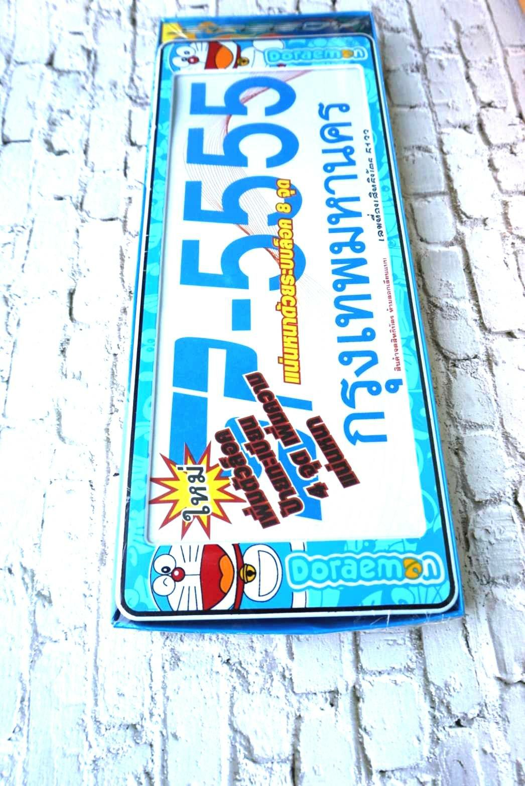 กรอบป้ายทะเบียนกันน้ำsp5555 ลายโดเรมอน เเบบสั้นสั้น - 4Gcarshop - ThaiPick