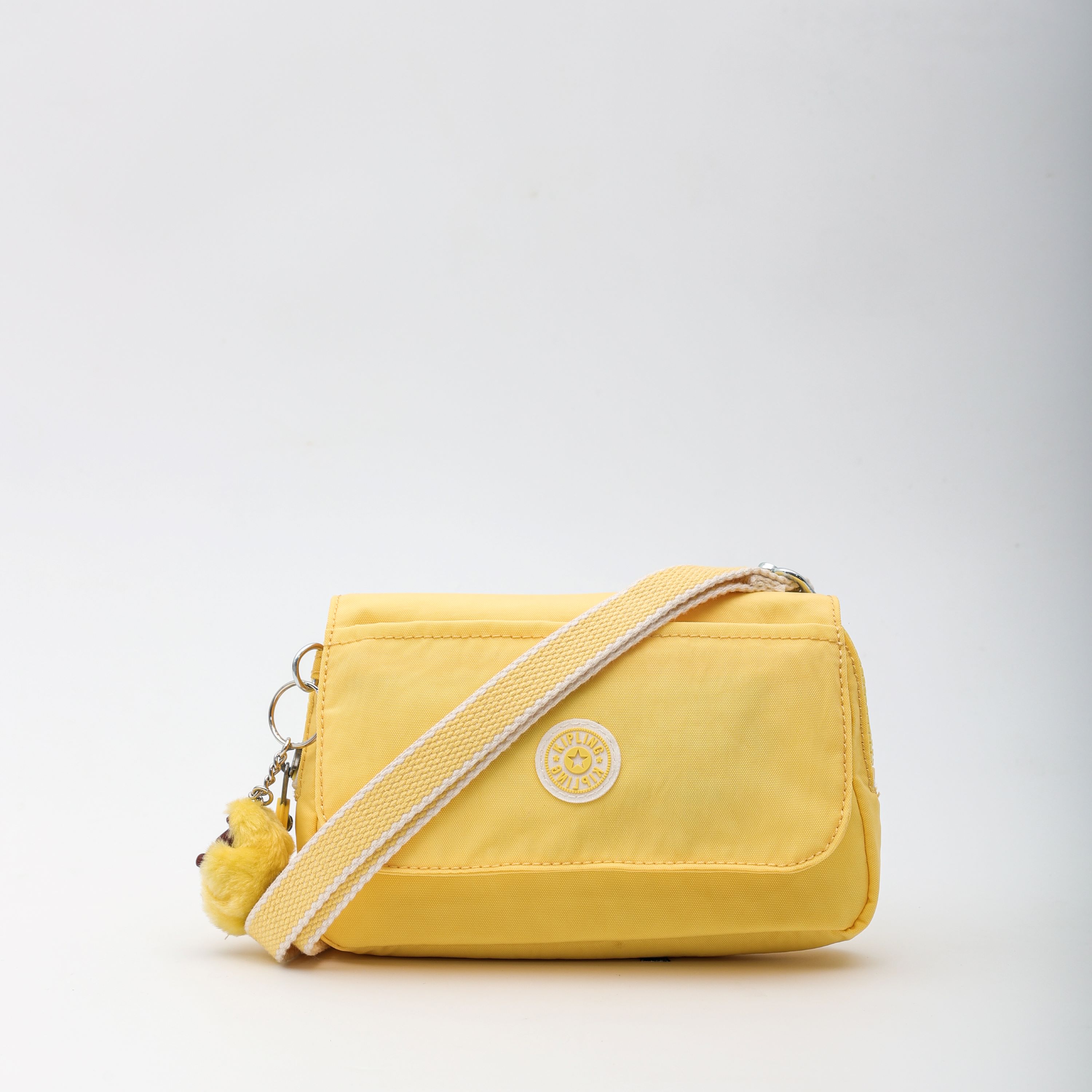 กระเป๋า KIPLING รุ่น AVERILL สี Sunflower Yellw - KIPLING - ThaiPick