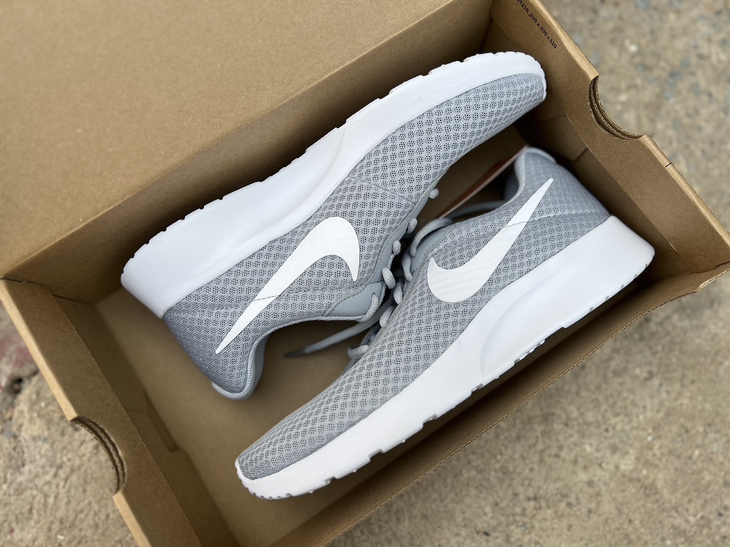 DJ6258-002 NIKE TANJUN รองเท้าลำลองชาย สีเทา - NikeCM - ThaiPick