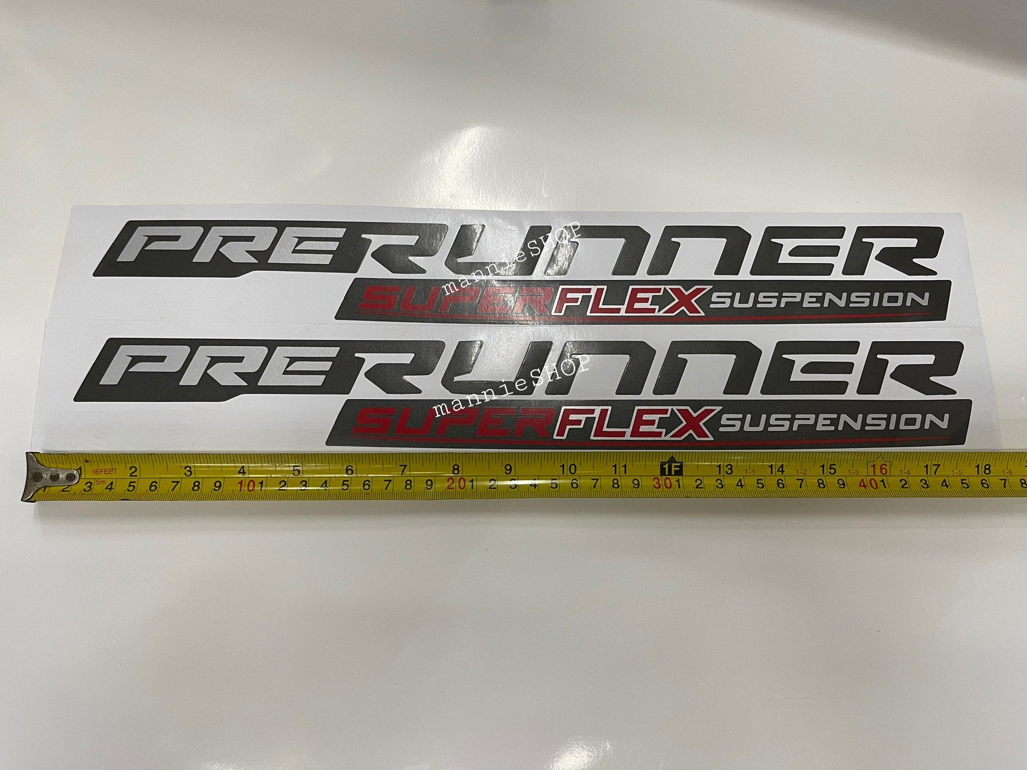 สติ๊กเกอร์งานสกรีน คำว่า PRERUNNER SUPER FLEX SUSPENSION ติดข้างท้ายรถ ...