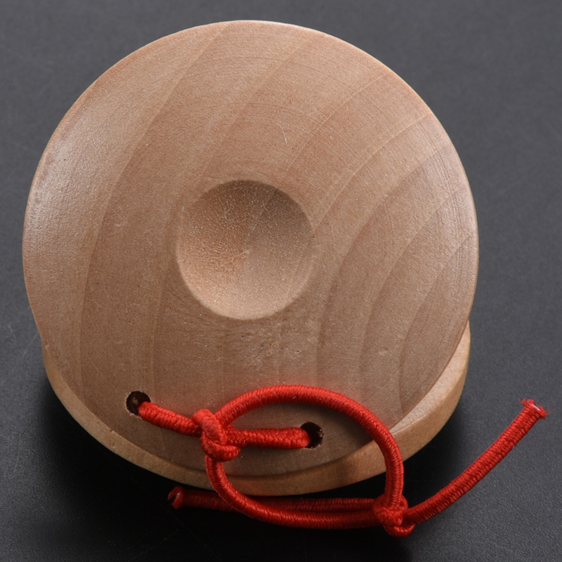 A pair of wooden flamenco musical instrument castanets of wood color ...