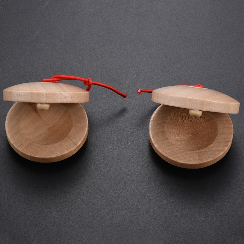 A pair of wooden flamenco musical instrument castanets of wood color ...