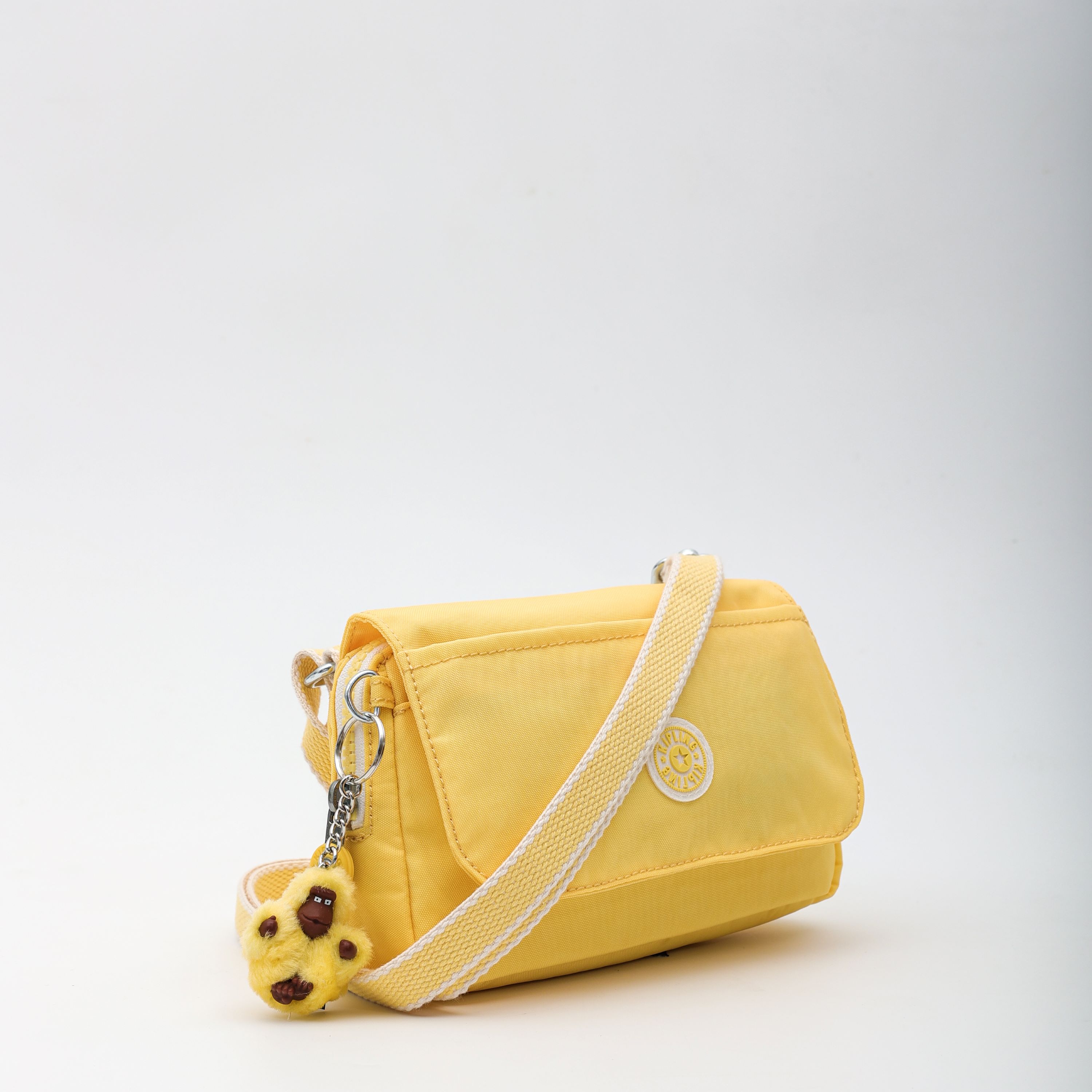 กระเป๋า KIPLING รุ่น AVERILL สี Sunflower Yellw - KIPLING - ThaiPick