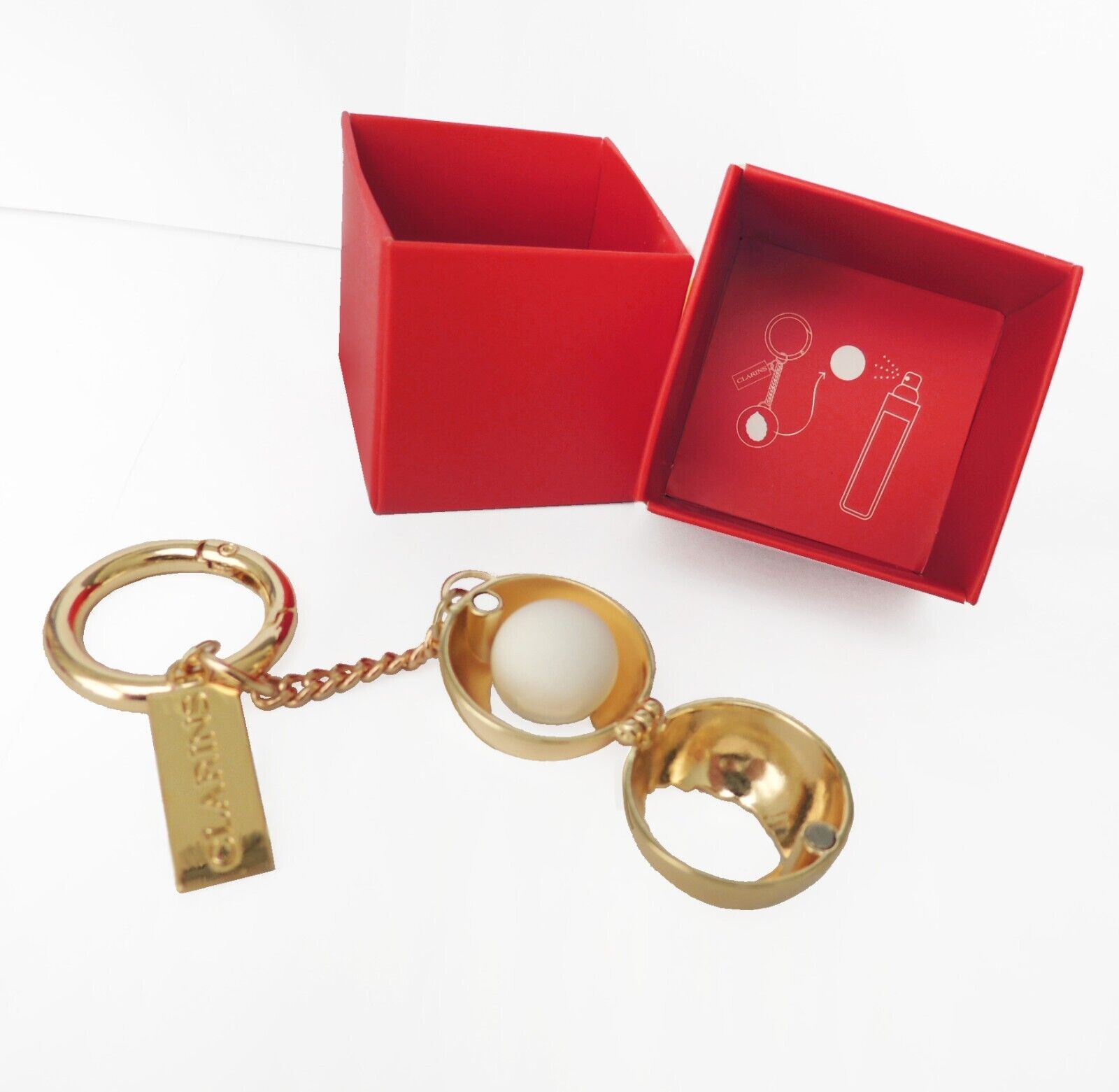 Clarins gold tone perfume diffuser keychain พวงกุญแจกระจายน้ำหอม ...