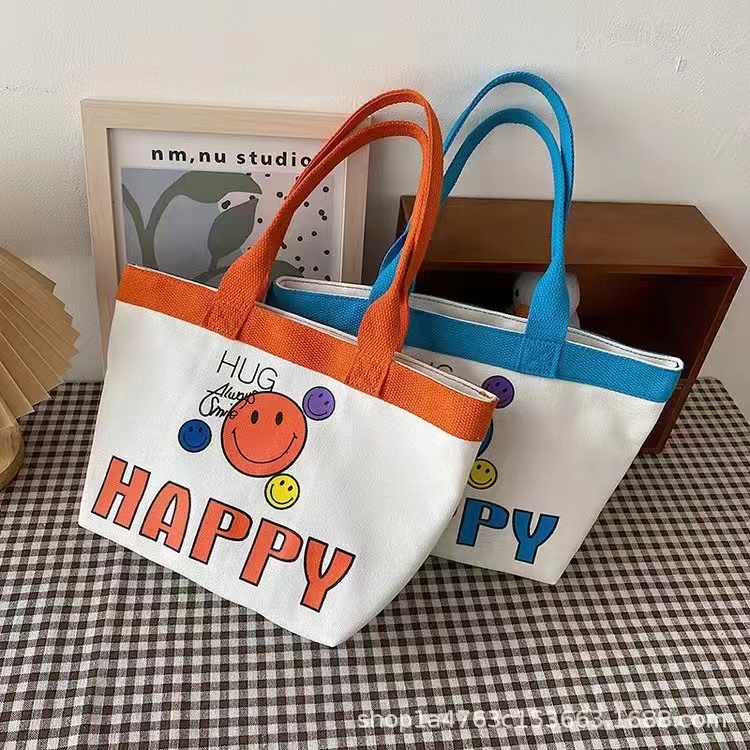 【พร้อมส่ง】Bag Fashion กระเป๋าถือ กระเป๋าผ้าใบ แฟชั่นมาใหม่ รุ่น happy - Dream - ThaiPick