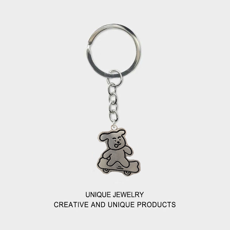 Skateboarding dog keychain simple cartoon creative personality key ins ...